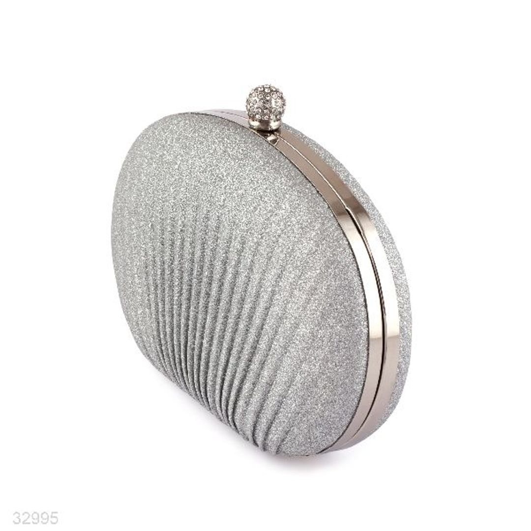 Buy Shimmering silver clam clutch Online in Pakistan On Tesoro at ...